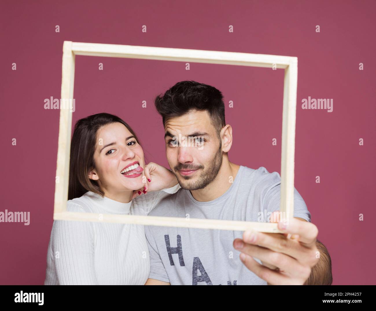 Hand hold holding empty picture frame hi-res stock photography and ...