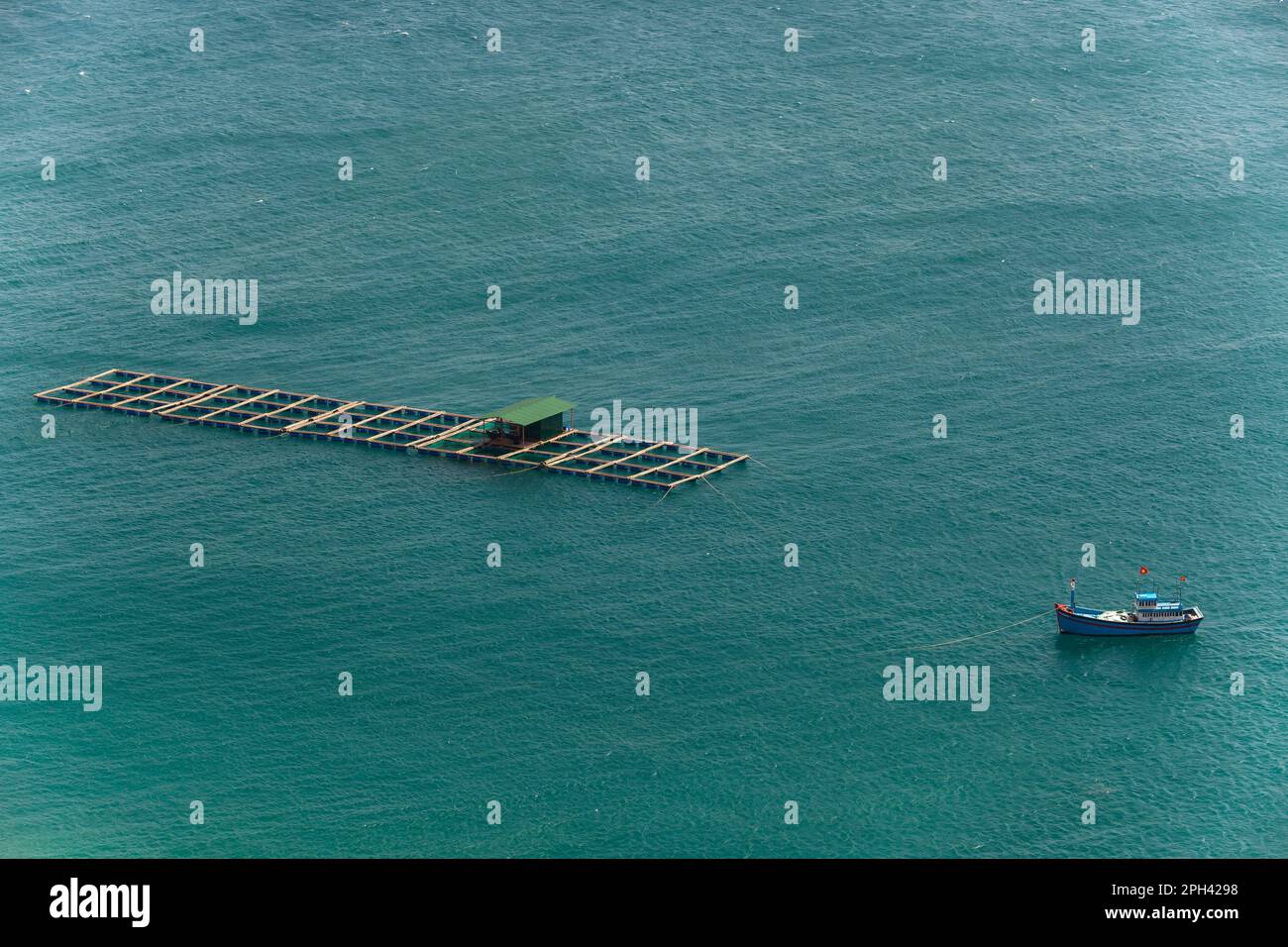 Fishing boat with fish traps in the China Sea, Ninh Thuan, Vietnam ...