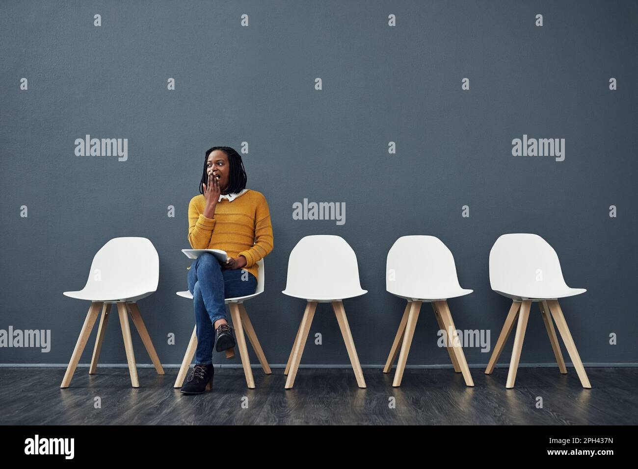 Ive been here for ages...Full length shot of an attractive young man ...