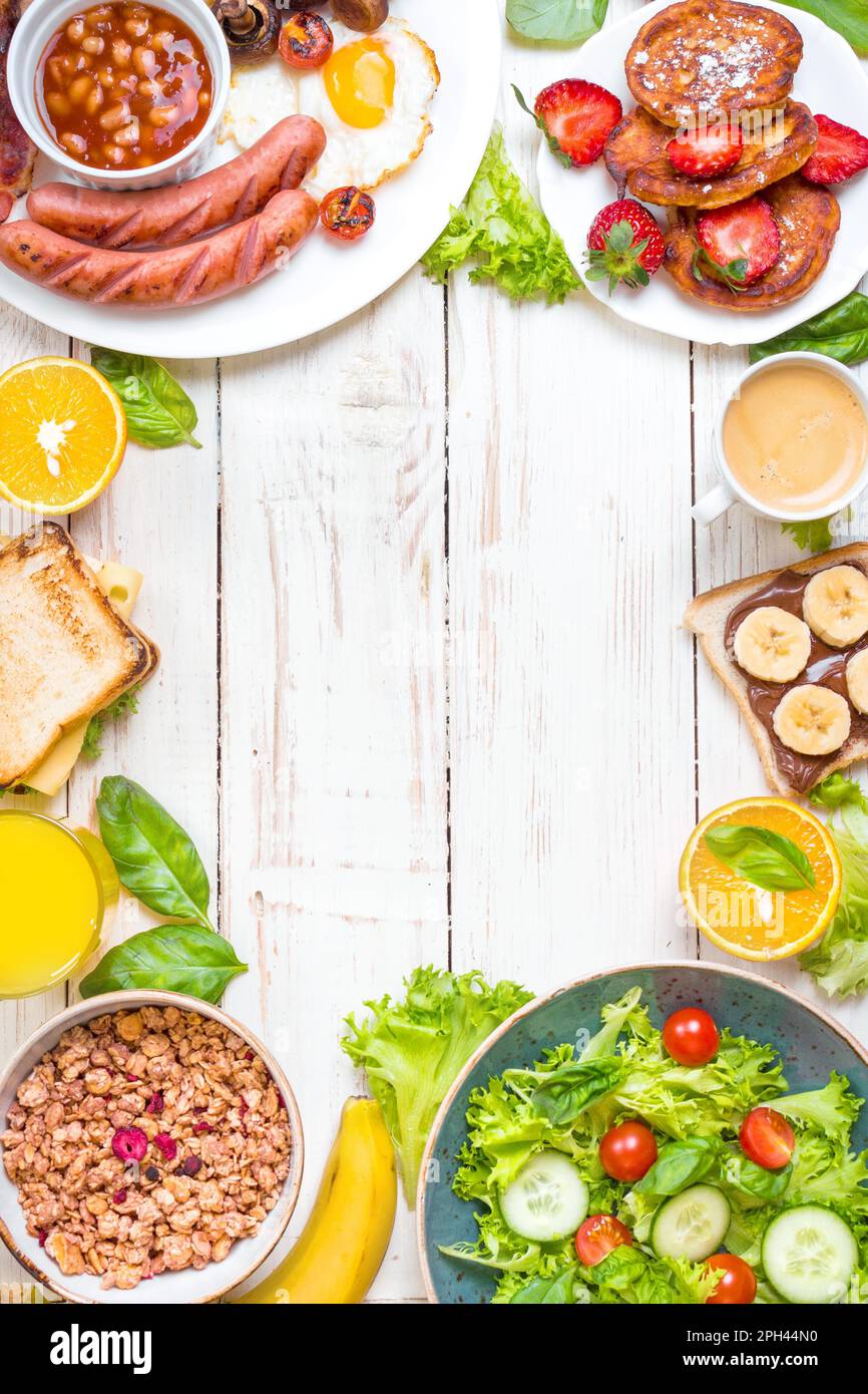 Assortment of breakfast choices. English breakfast, sausages, fried ...