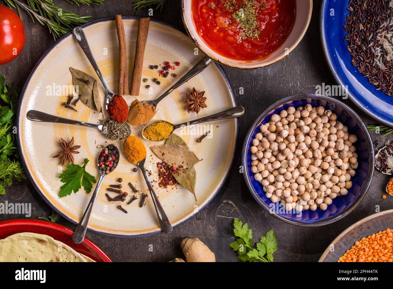 Assorted spices, herbs, chick-pea, lentil, basmati and wild rice mix ...
