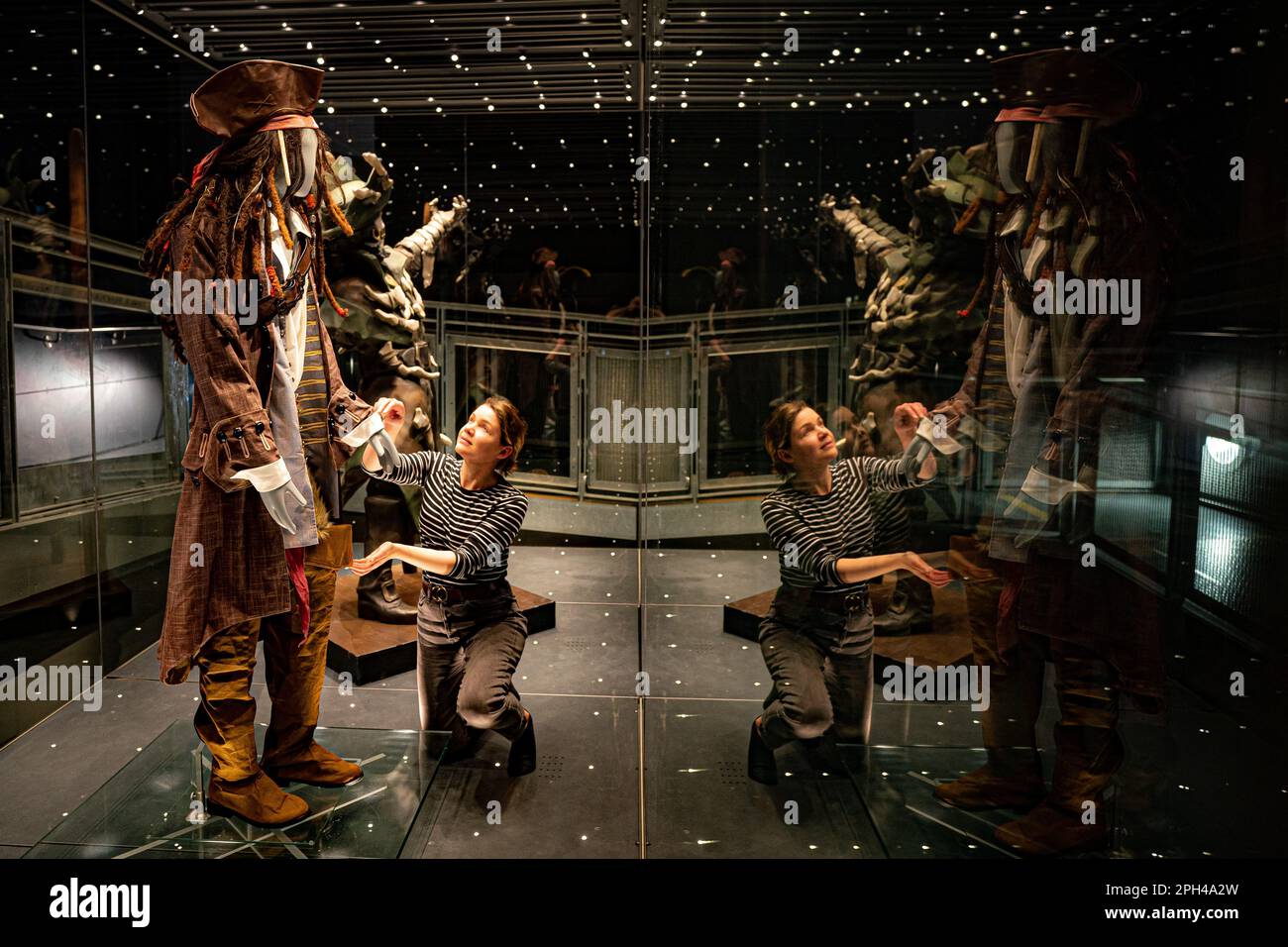 Costumes and pirate inspired designer fashion outfits are positioned ...