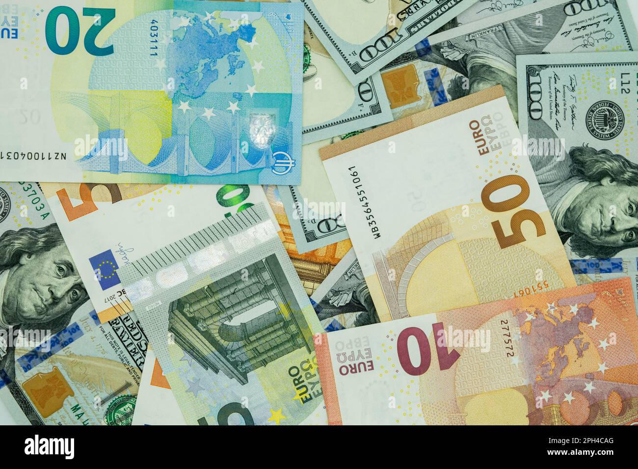 Dollar banknotes, euros filling the entire background Stock Photo - Alamy