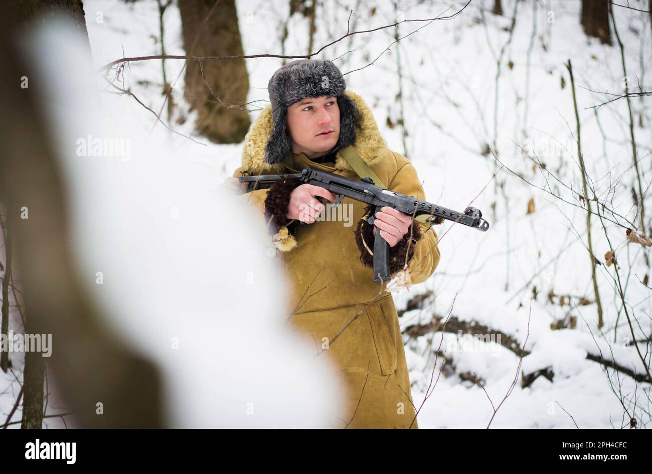 Soviet soldier in the winter forest. Retro photo Stock Photo - Alamy