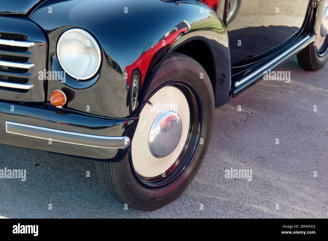 Left front view of an old italian classic car . Particular view of left ...