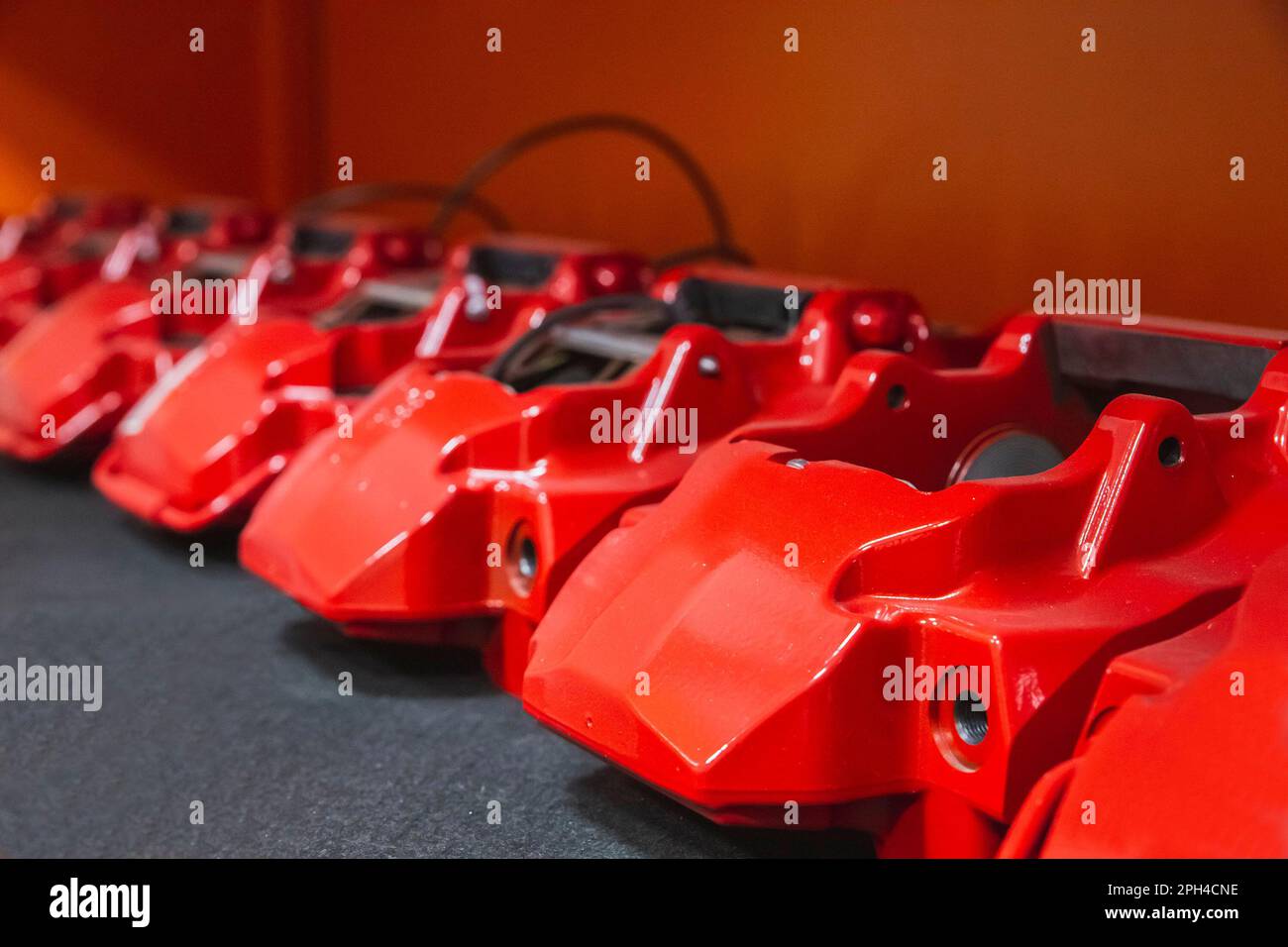 red car supports which are used in brakes lie in a row Stock Photo - Alamy