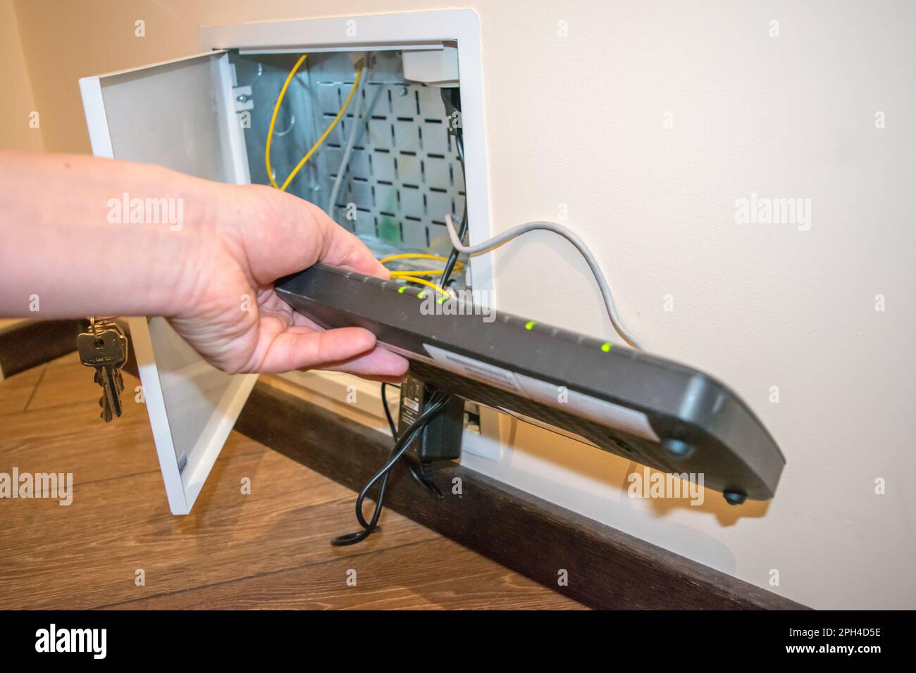 Open box to router, human hand human hand is holding black router Stock ...