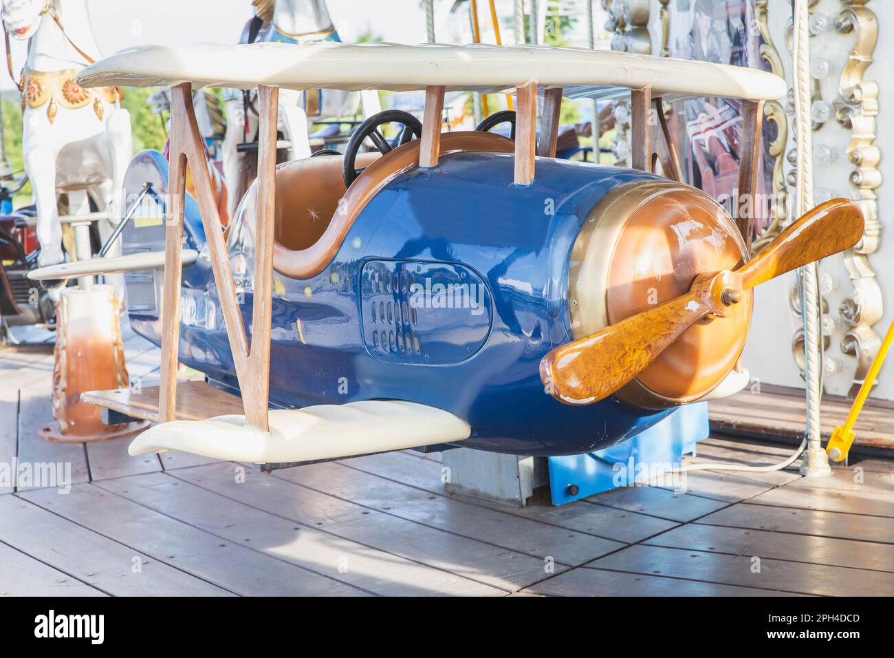 toy plane on a beautiful carousel in an amusement park in Ukraine Stock ...