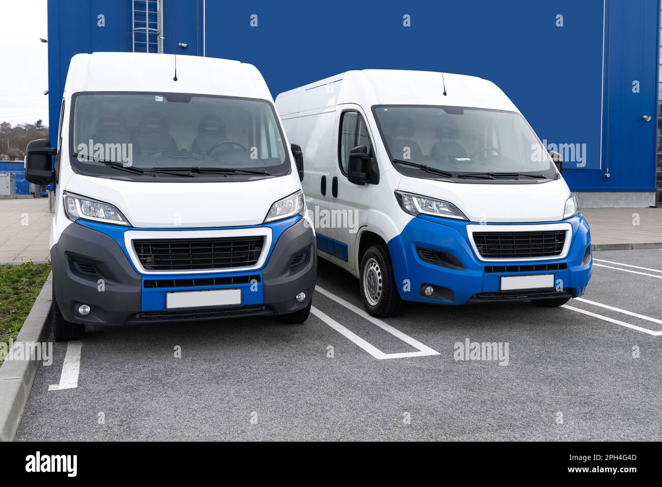 Vans are parked in row. Commercial fleet. High quality photo Stock ...
