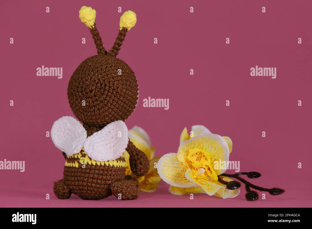 One bee brown with yellow stripes and funny wings and horns crocheted ...