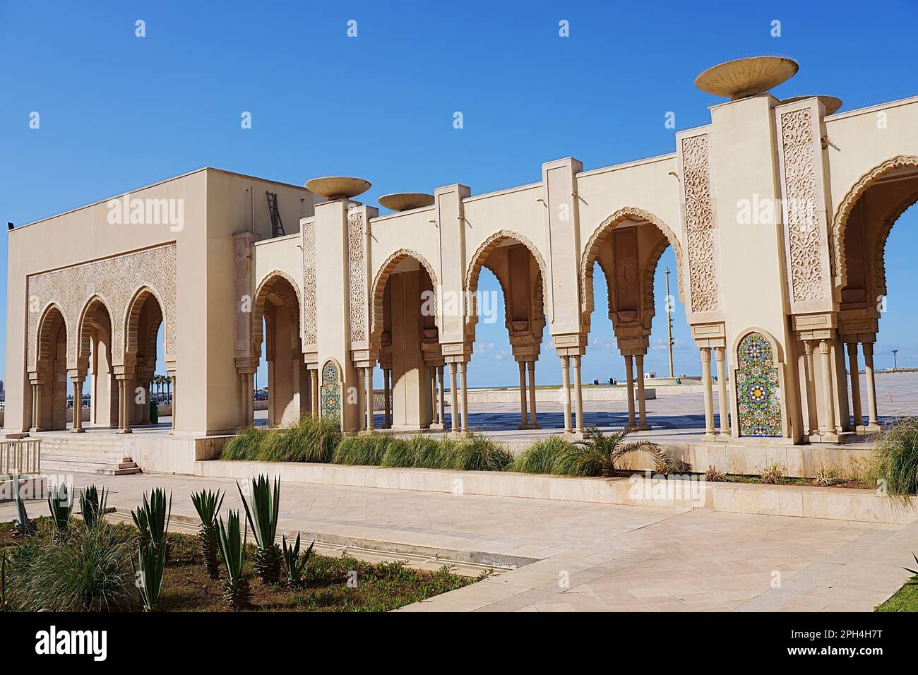 Stylish arcades of Hassan II mosque at african Casablanca city in ...