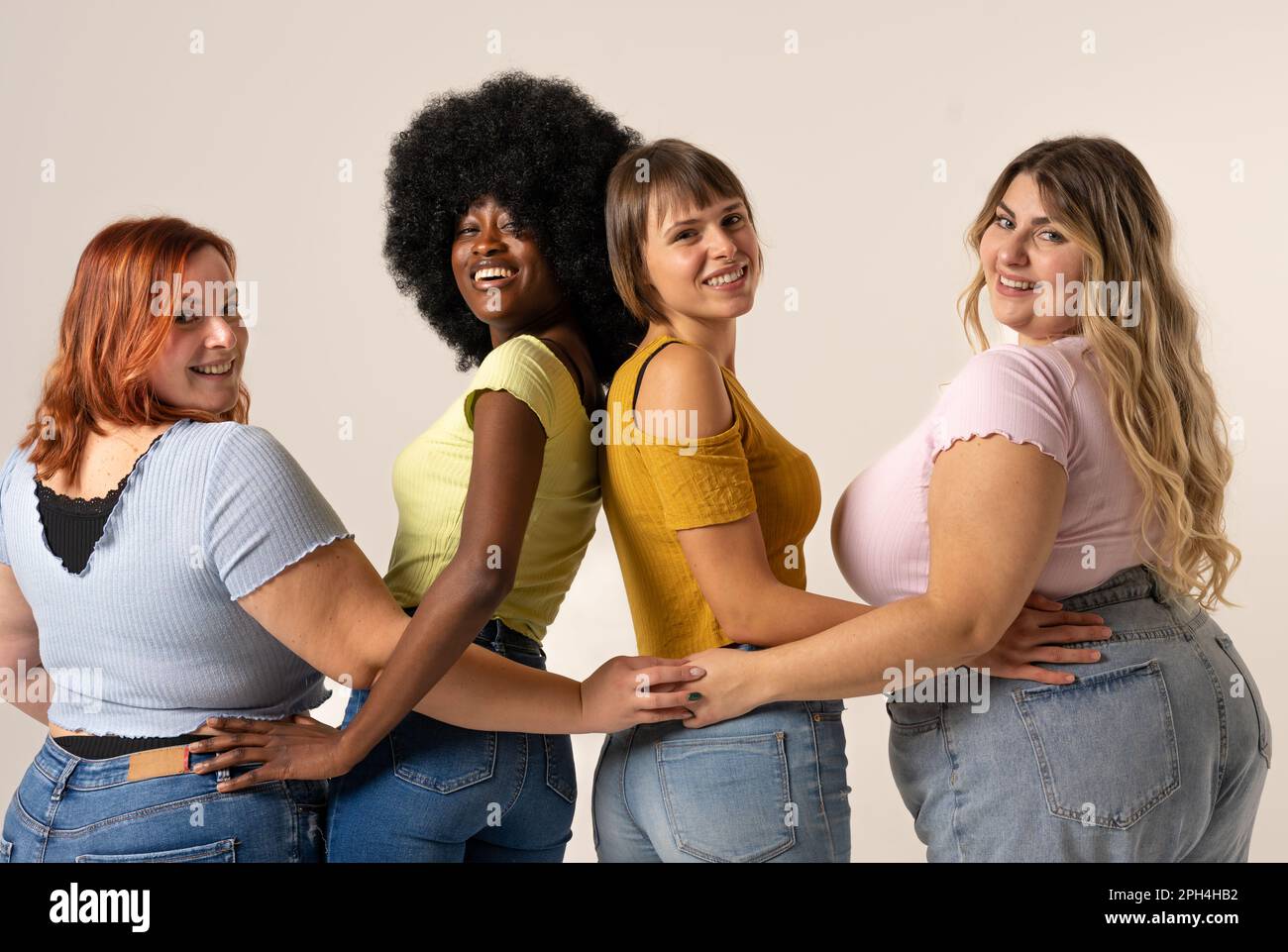 Four diverse and confident women of different nationalities and body ... Four diverse and confident women of different nationalities and body ...