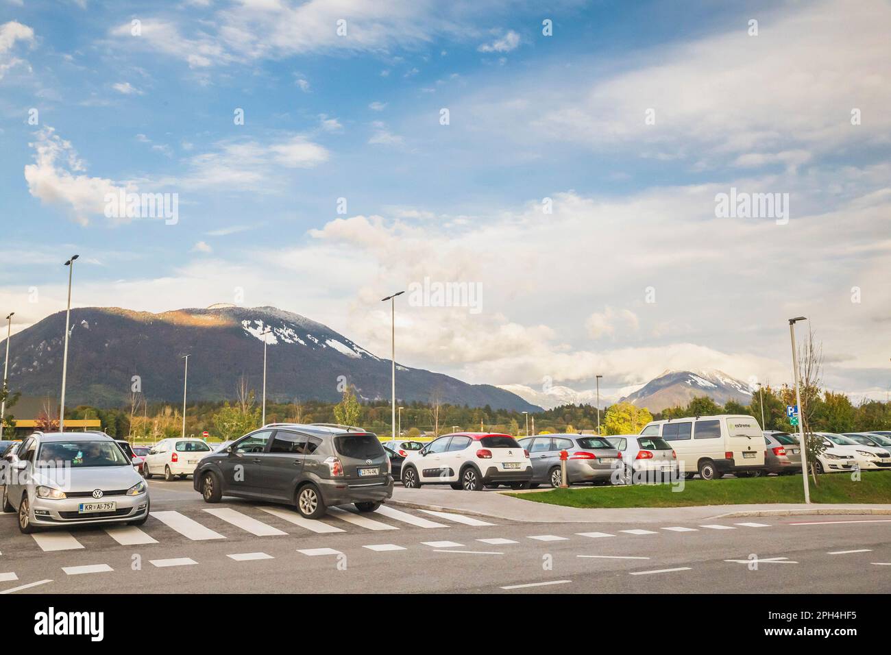 Car parking with views of the Julian Alps in Slovenia Stock Photo - Alamy