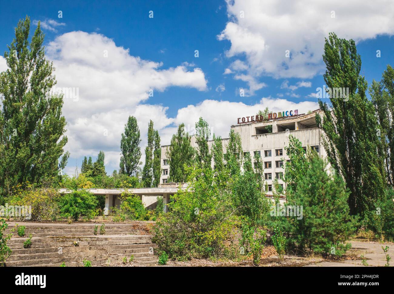 Ruined hotel Polissya overgrown with wild forest in Chernobyl Stock ...