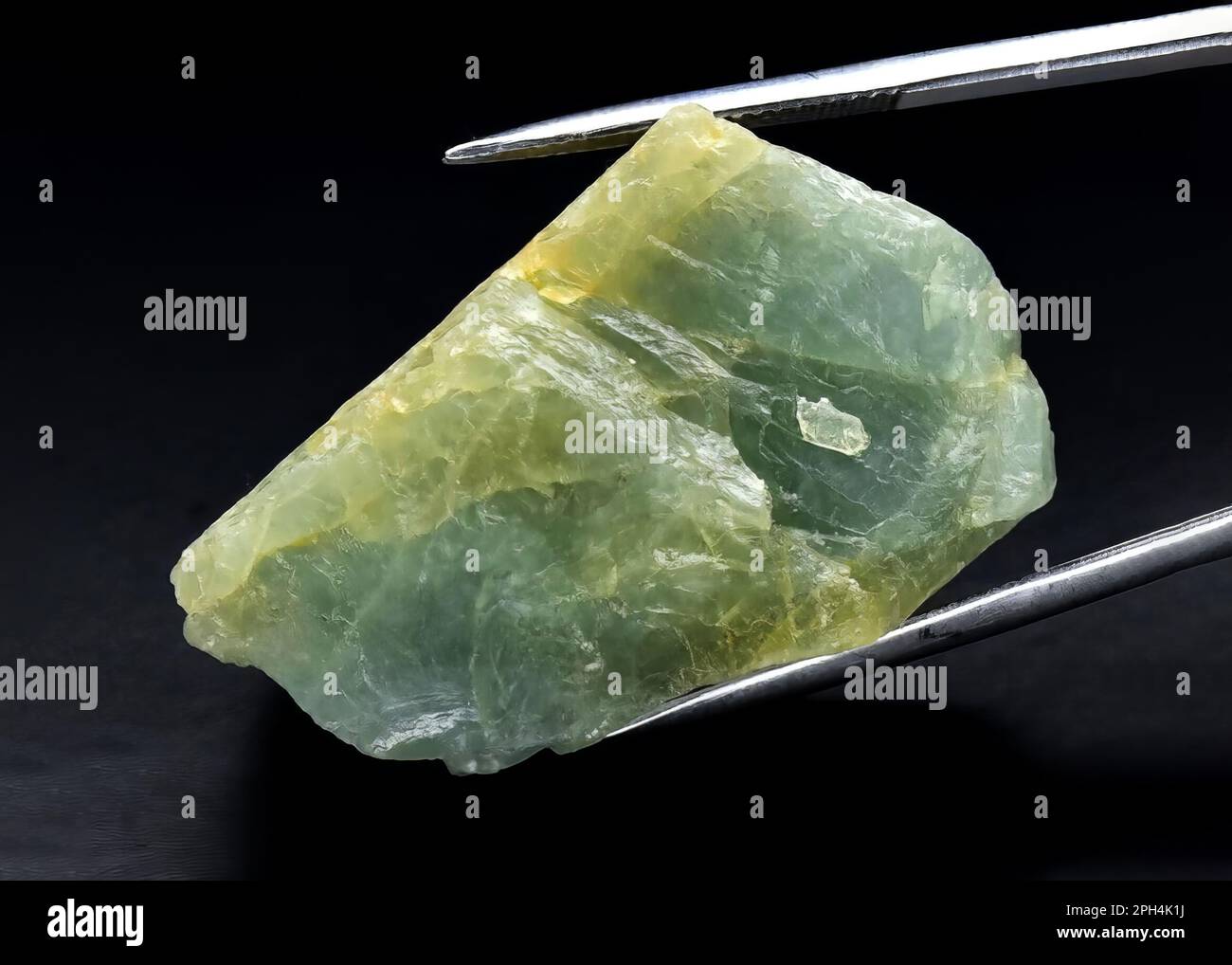 Natural gem green beryl on black background Stock Photo - Alamy
