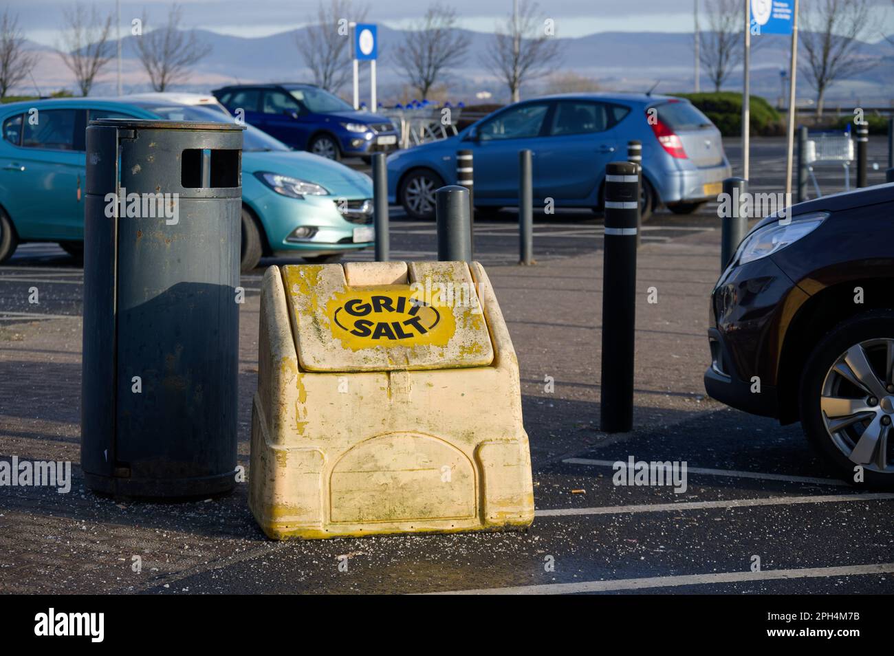 Salt grit yellow container for winter road safety on council road Stock ...