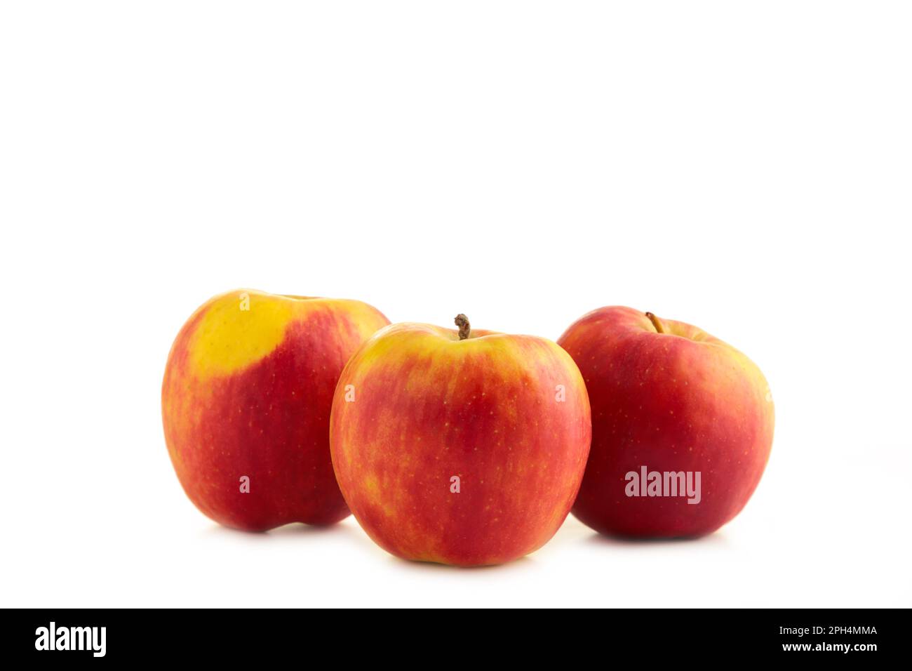Three red apples isolated on white background, top view Stock Photo - Alamy