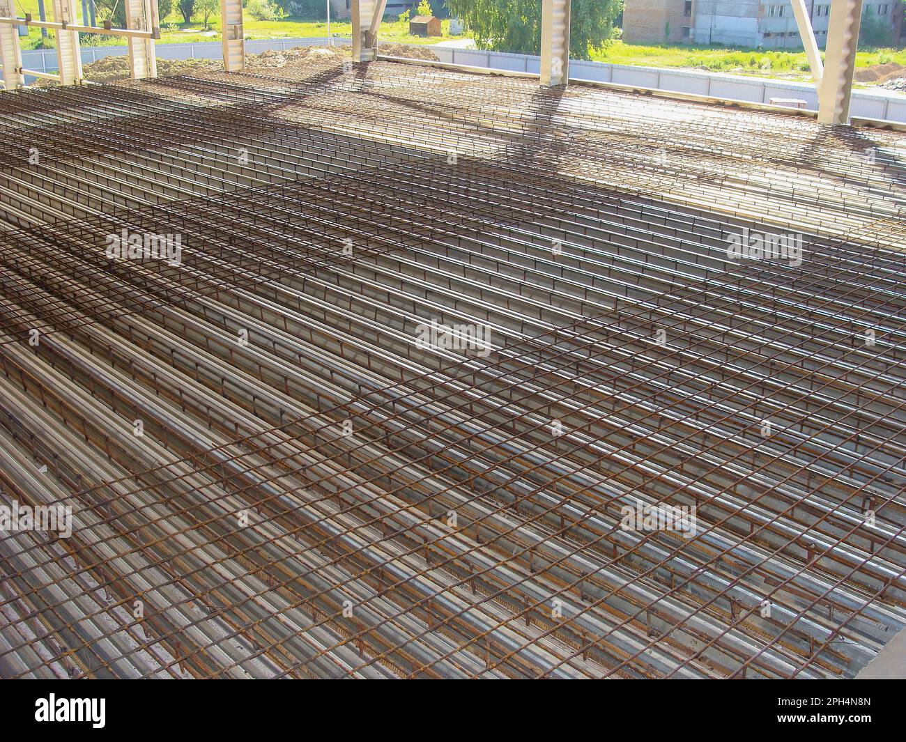 Installation of a reinforced concrete monolithic ceiling on formwork ...