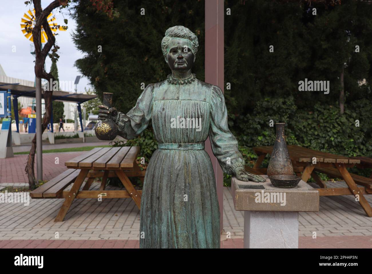 The Statue of Marie Curie Holding Her Science Experiment Equipment ...