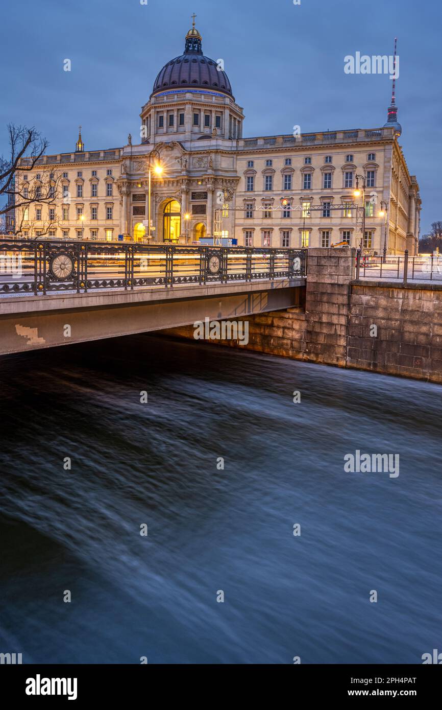 The rebuilt Berlin City Palace with a small canal at dusk Stock Photo ...