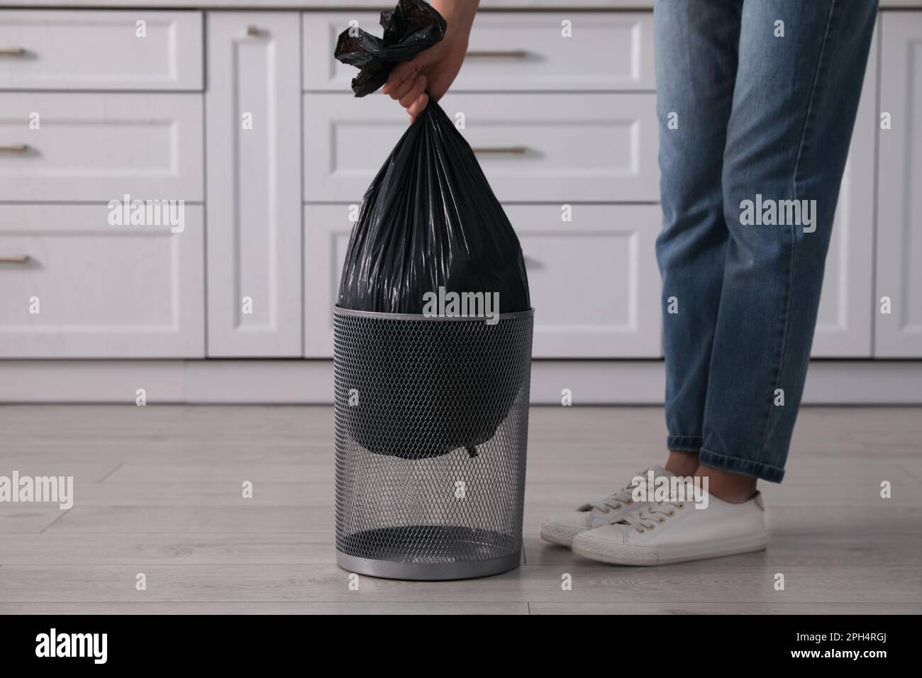 Person taking garbage out hi-res stock photography and images - Alamy