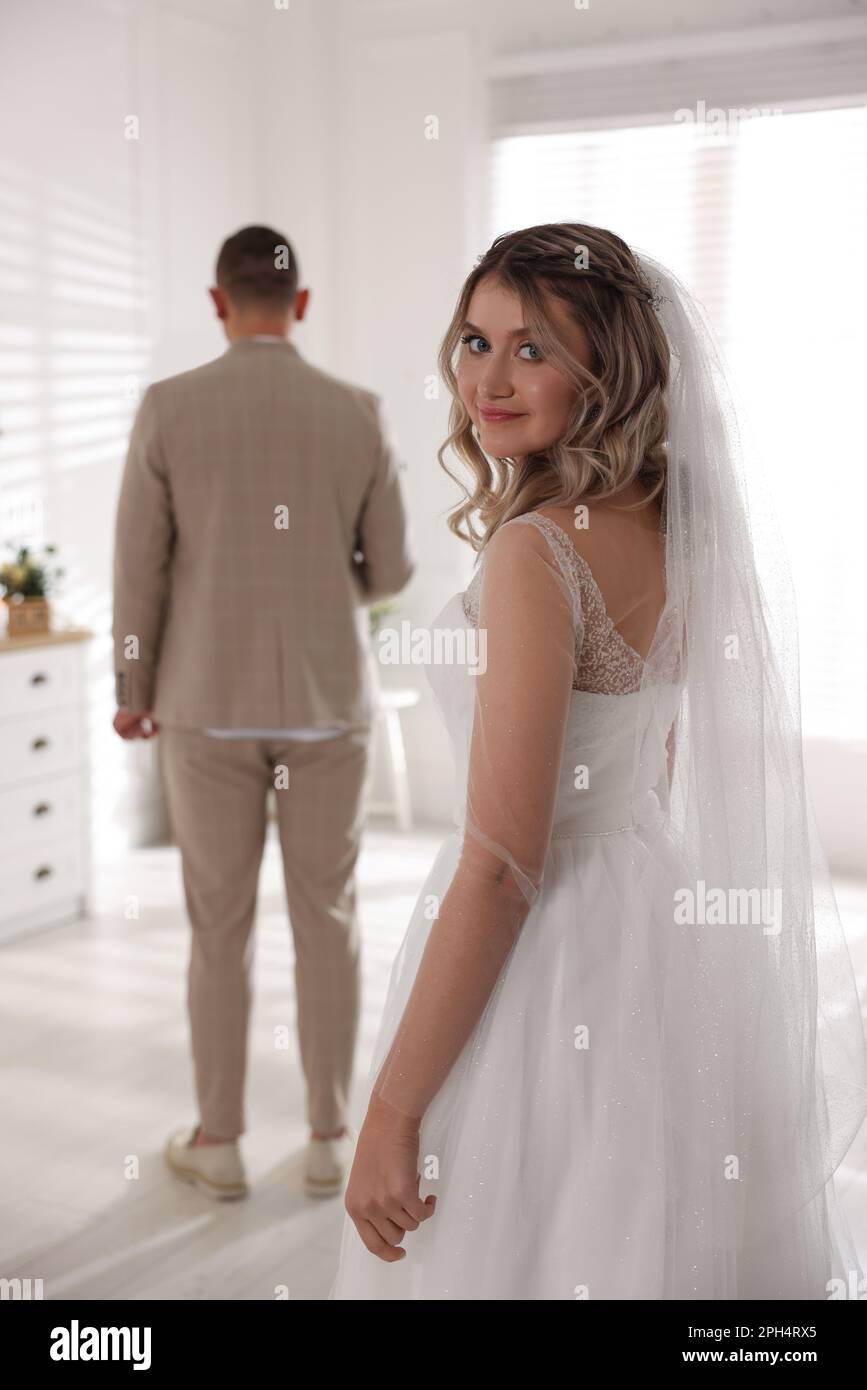 Happy handsome groom waiting hi-res stock photography and images - Alamy