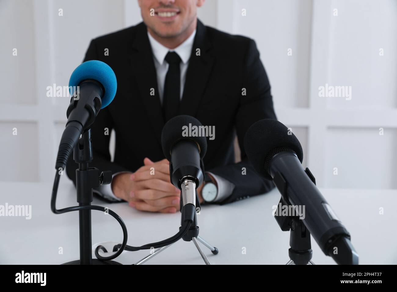 Business man giving interview at official event, closeup Stock Photo ...
