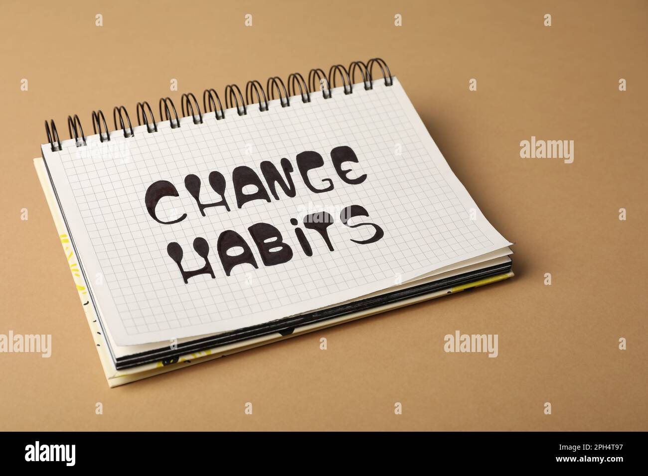 Open notebook with phrase Change Habits on brown background Stock Photo ...