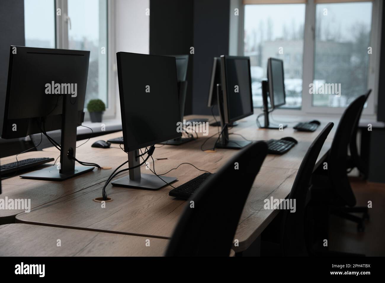 Many modern computers in open space office Stock Photo - Alamy