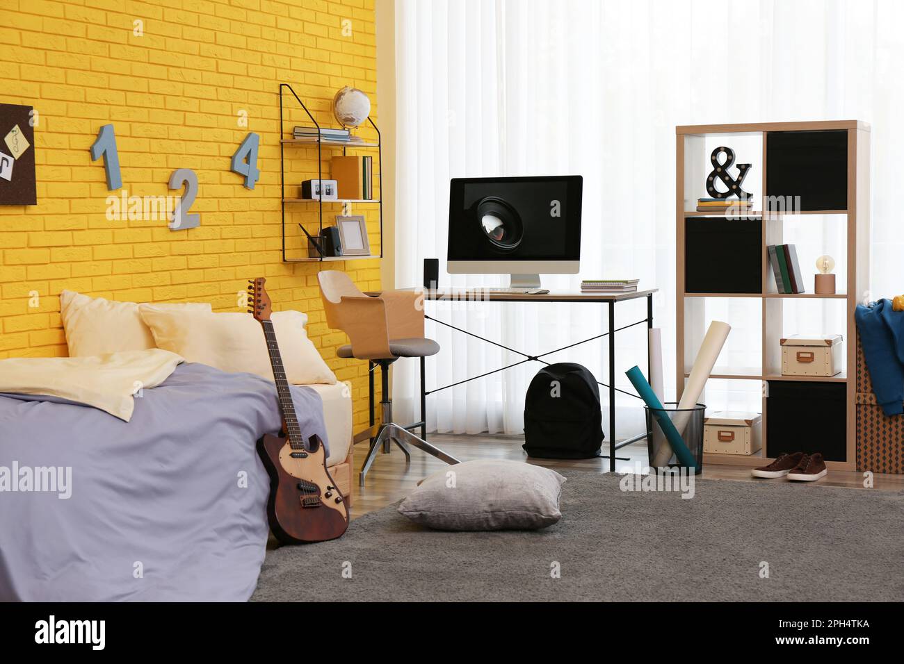 Stylish teenager's room interior with computer and bed Stock Photo - Alamy