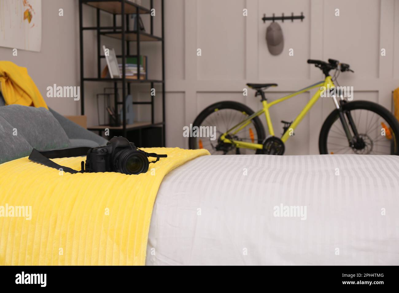 Modern camera on bed in stylish teenager's room interior Stock Photo ...
