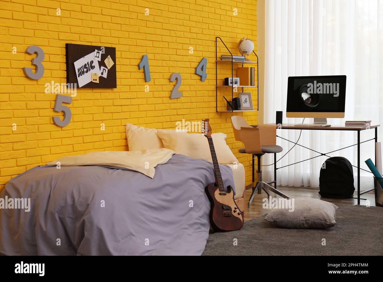 Stylish teenager's room interior with computer and bed Stock Photo - Alamy