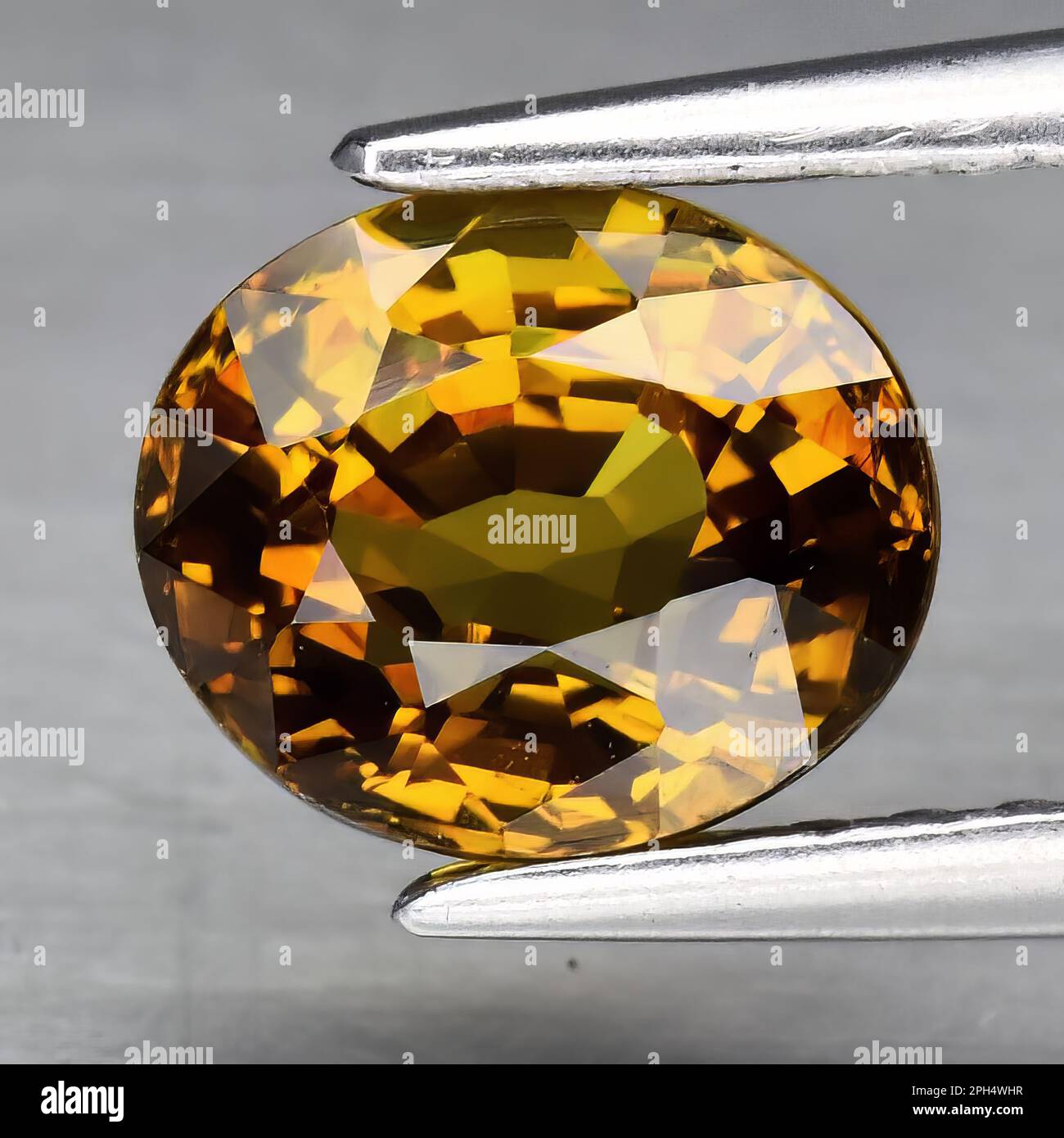 Natural grossular garnet gemstone on gray background Stock Photo - Alamy