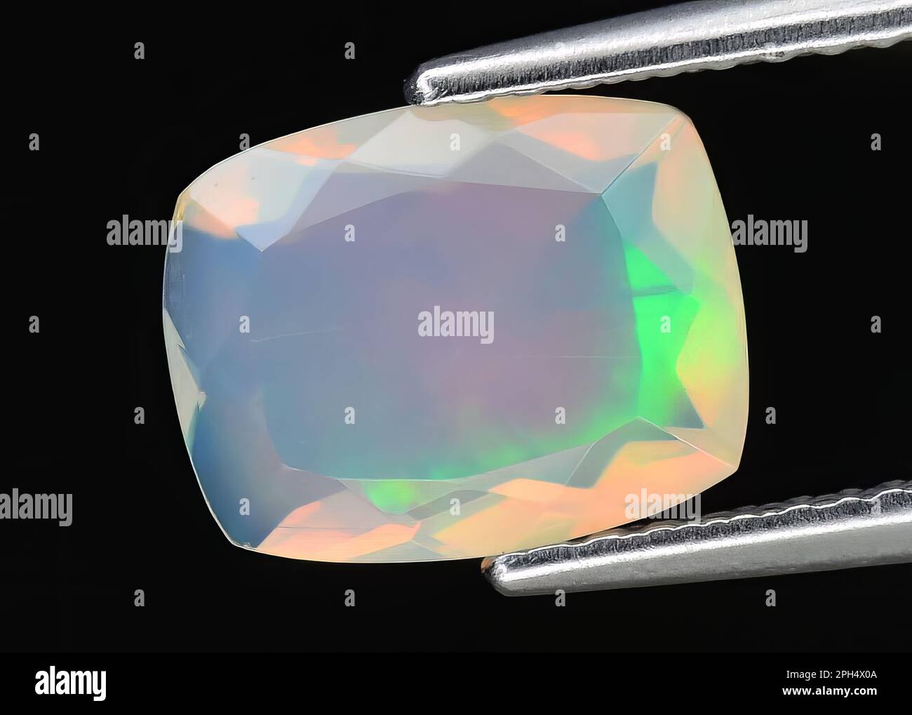 Natural precious stone noble opal on a black background Stock Photo - Alamy