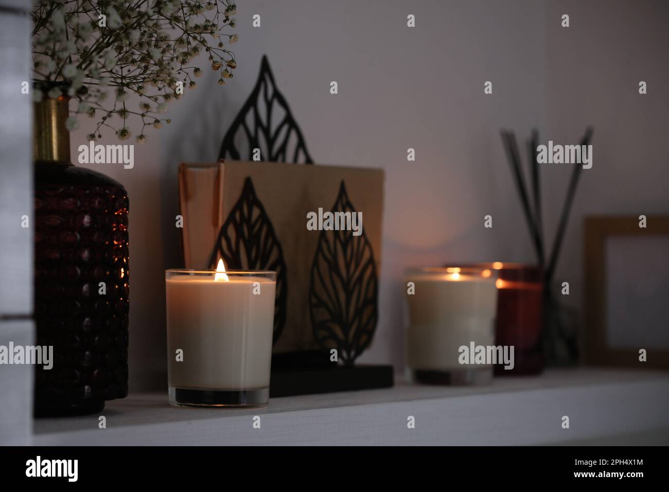 Shelf vase candles hi-res stock photography and images - Alamy