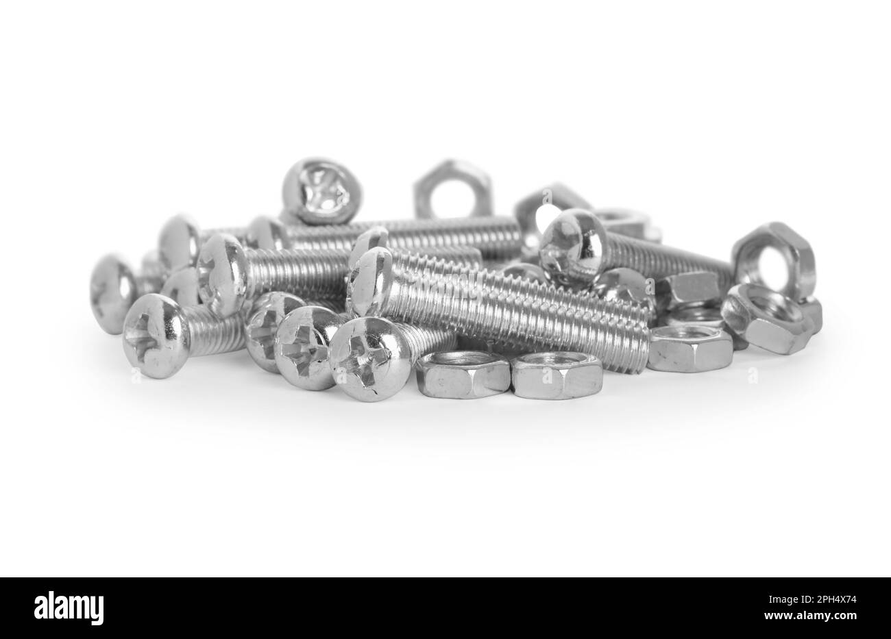 Many metal bolts and nuts on white background Stock Photo - Alamy
