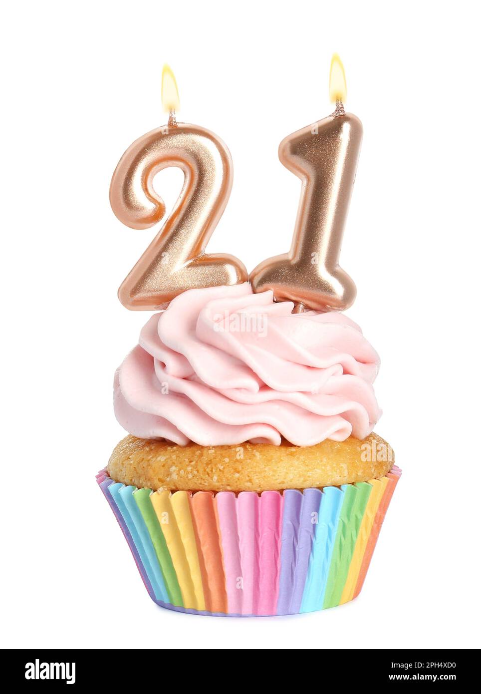 Delicious cupcake with number shaped candles on white background ...