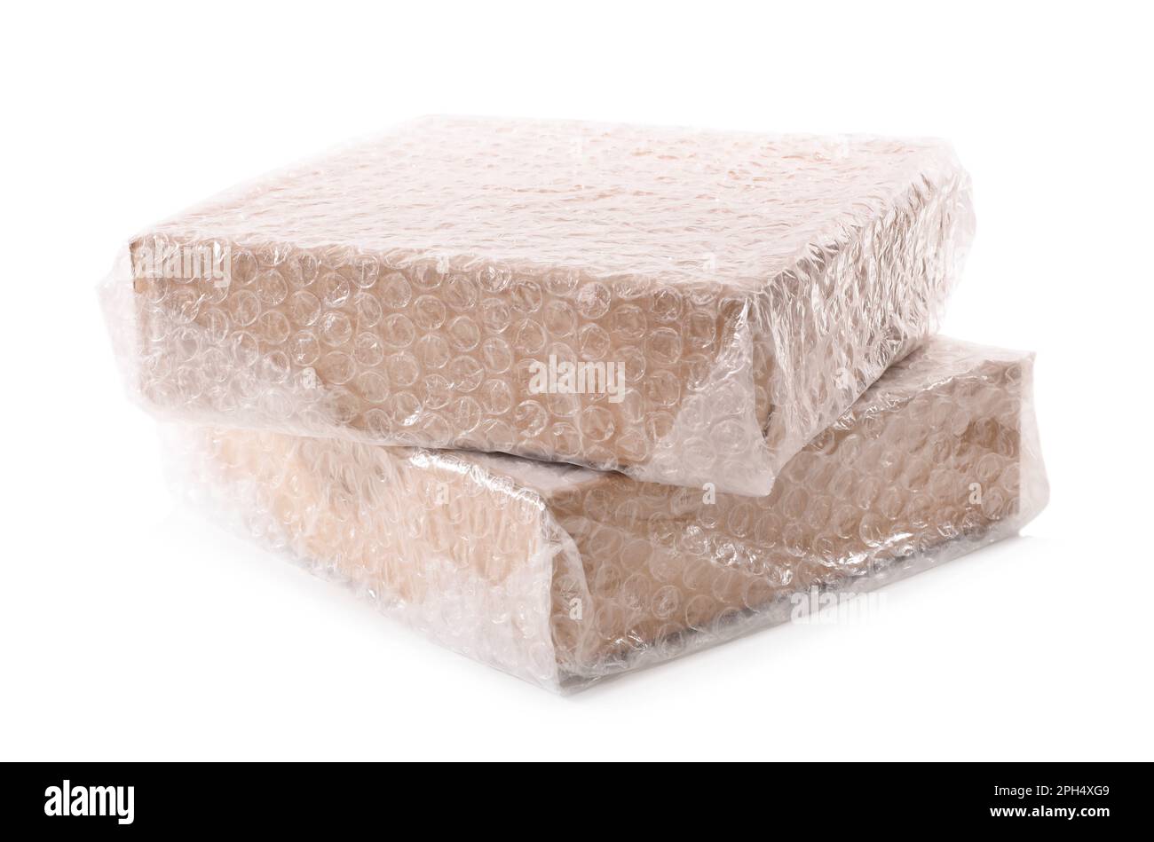 Cardboard boxes packed in bubble wrap on white background Stock Photo ...