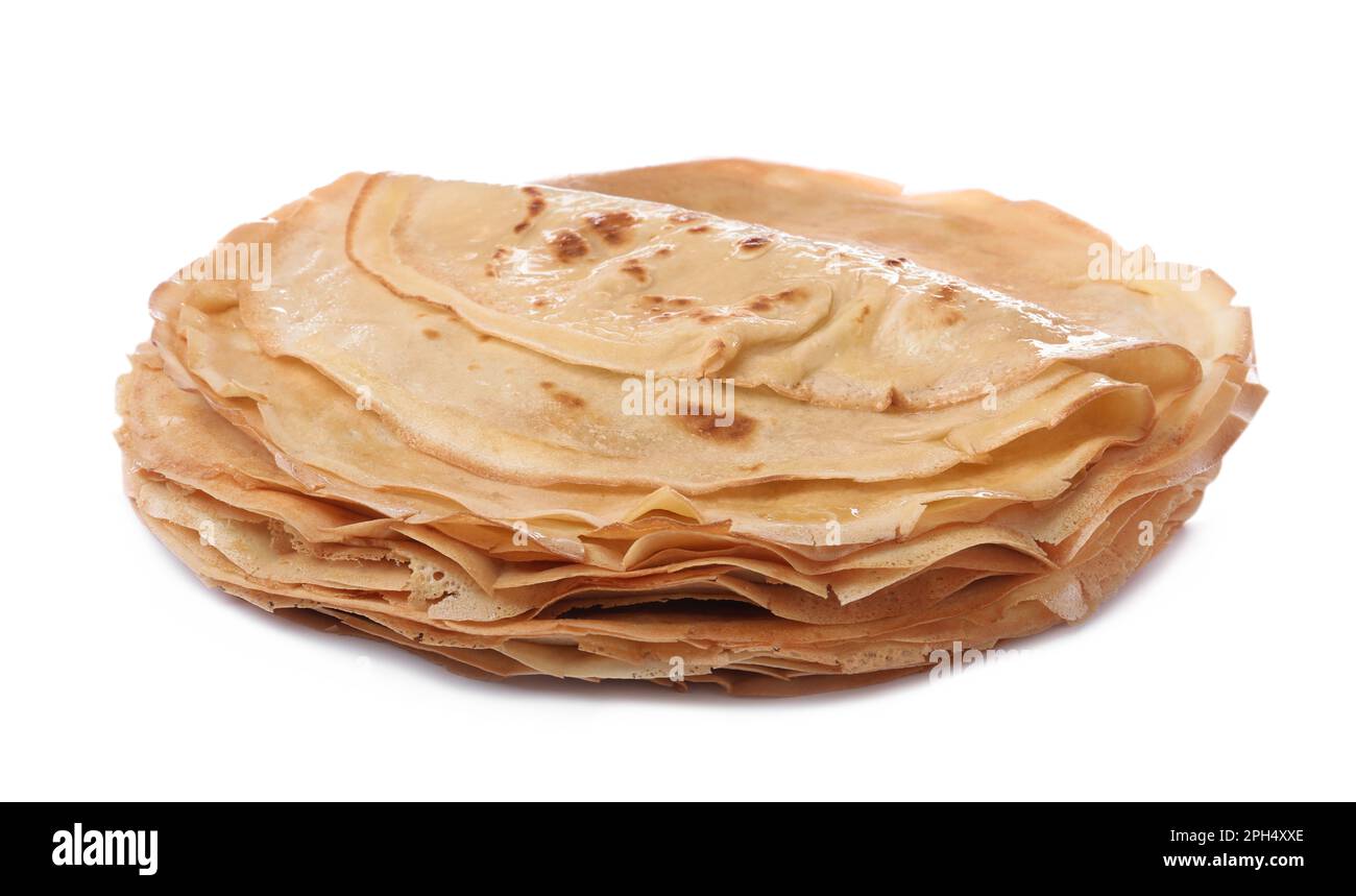 Stack of delicious crepes on white background Stock Photo - Alamy