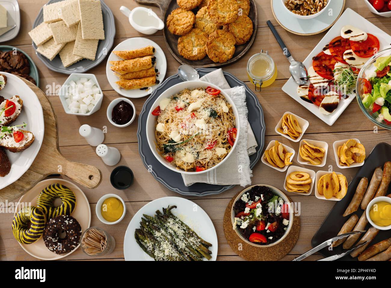 Brunch table setting with different delicious food, flat lay Stock ...