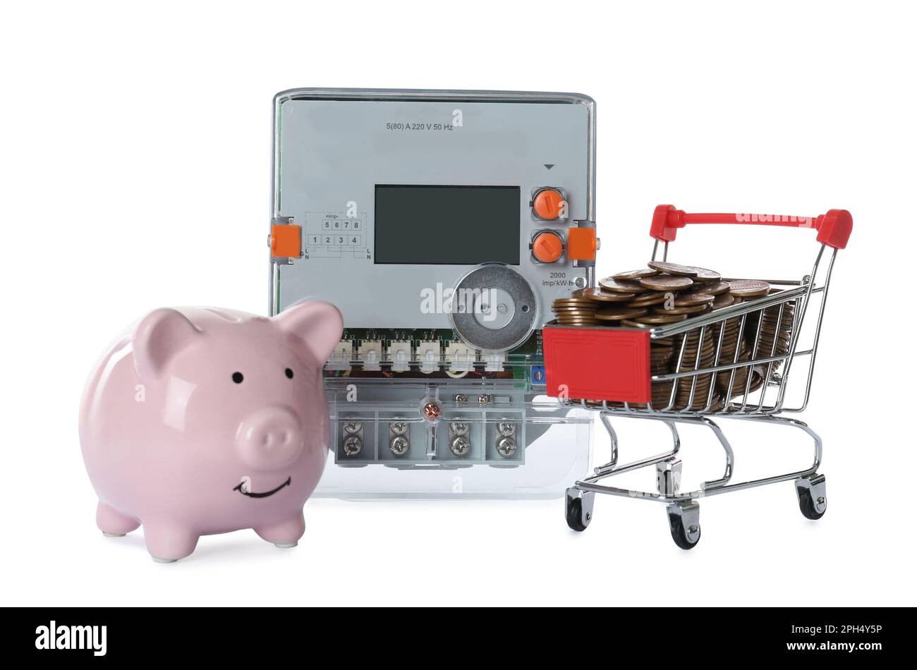 Electricity meter, pink piggy bank and small shopping cart with coins ...