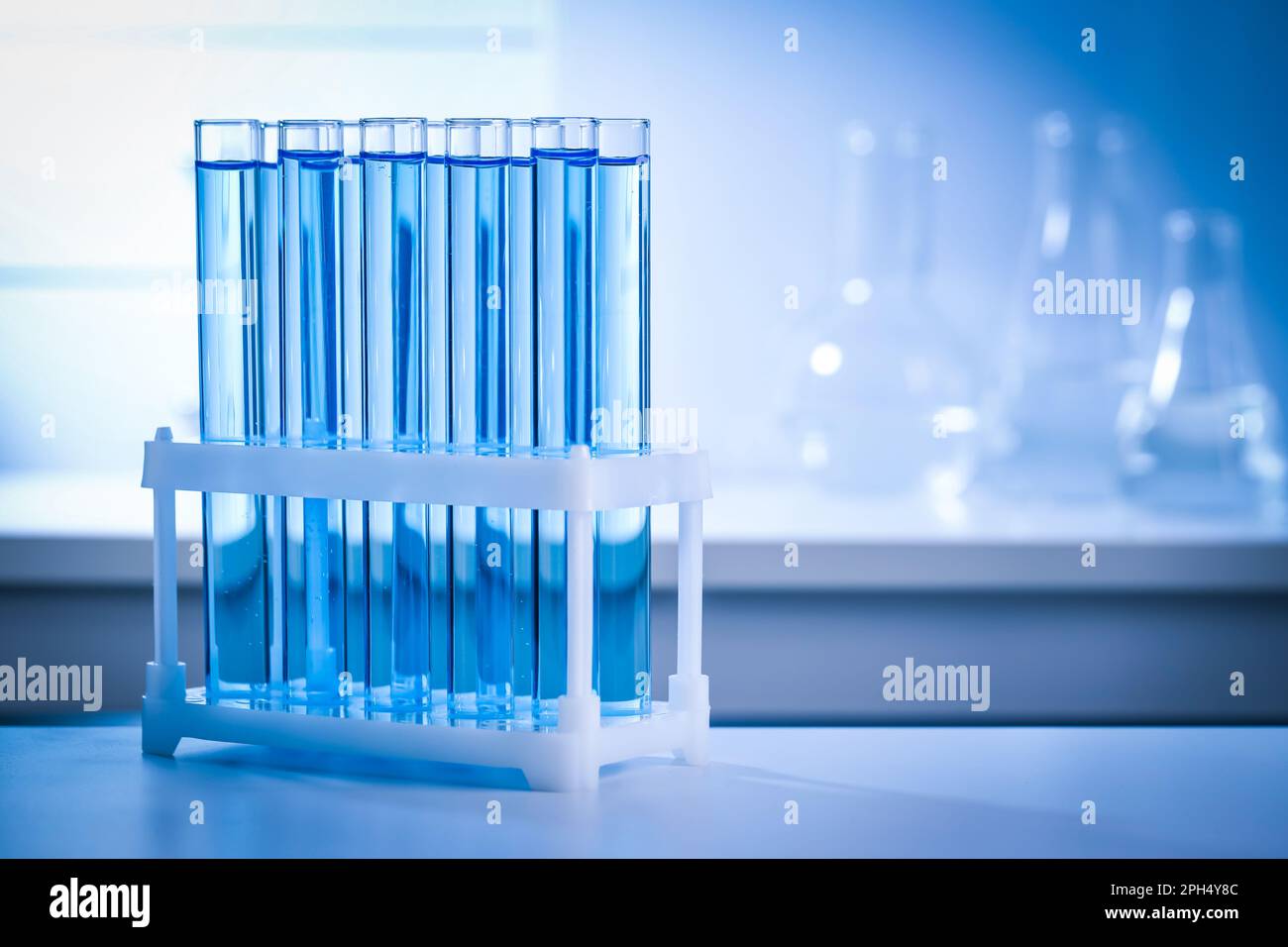 Test tubes with reagents on table in laboratory, space for text Stock ...