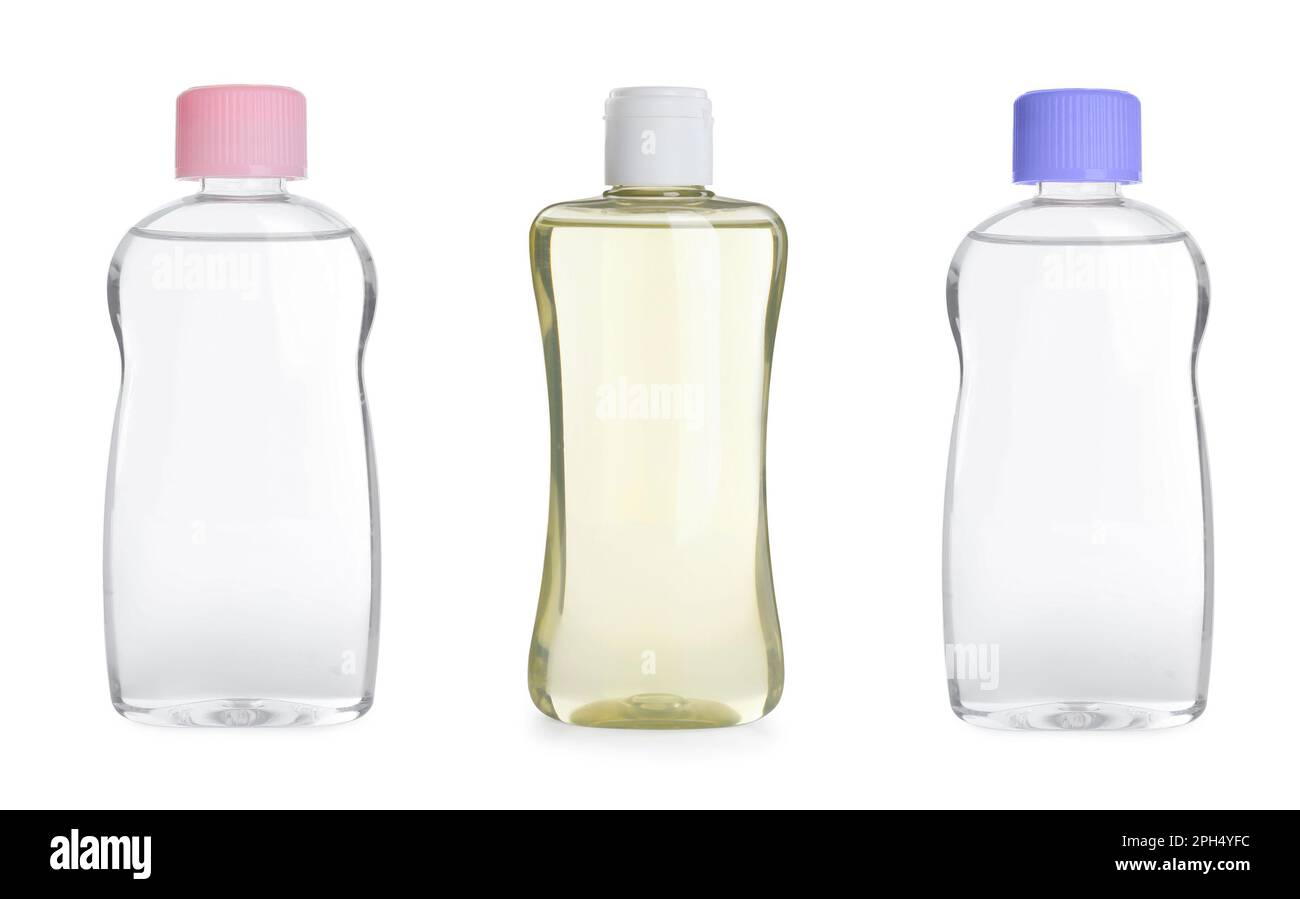 Set with bottles of baby oil on white background Stock Photo - Alamy