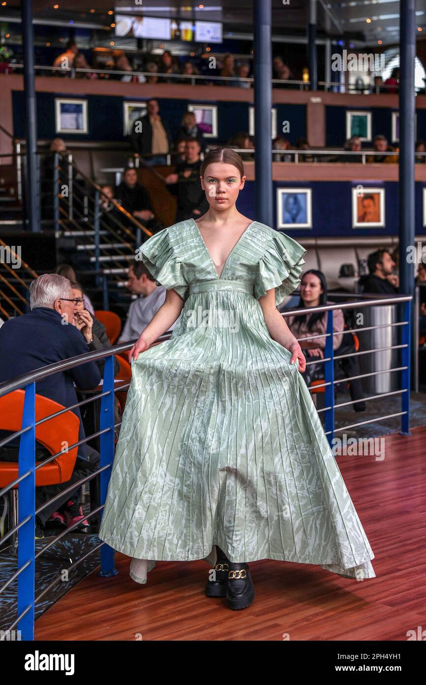 Helsinki, Finland. 24th Mar, 2023. A model showcasing a dress from ...