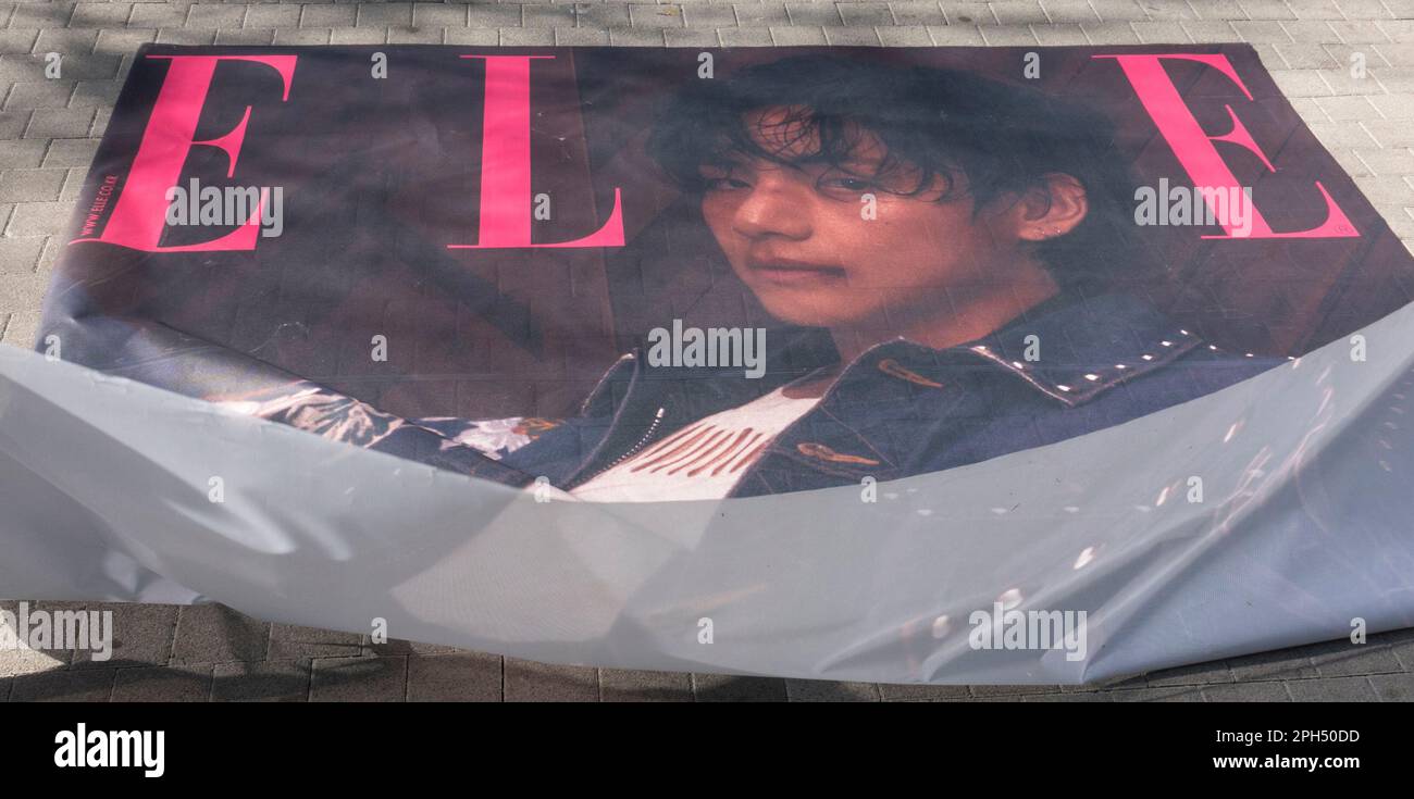 BTS V, Mar 26, 2023 : A placard showing BTS V featured in ELLE Korea's ...