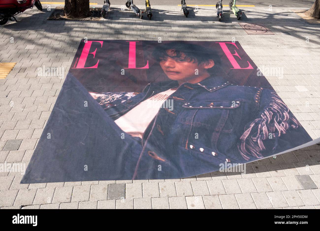 BTS V, Mar 26, 2023 : A placard showing BTS V featured in ELLE Korea's ...