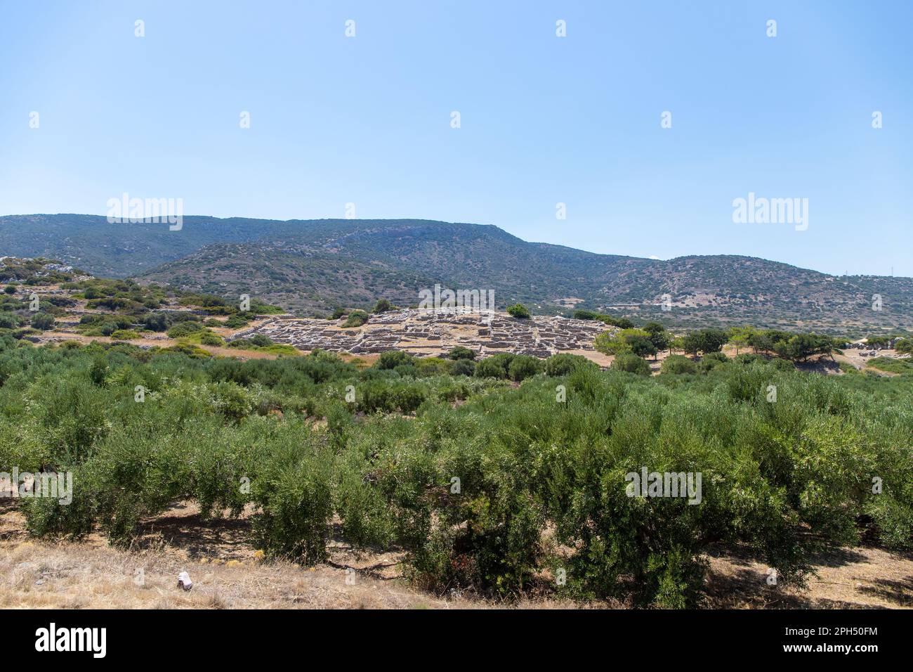 Ancient archaeological site in Crete with stone ruins. High quality ...