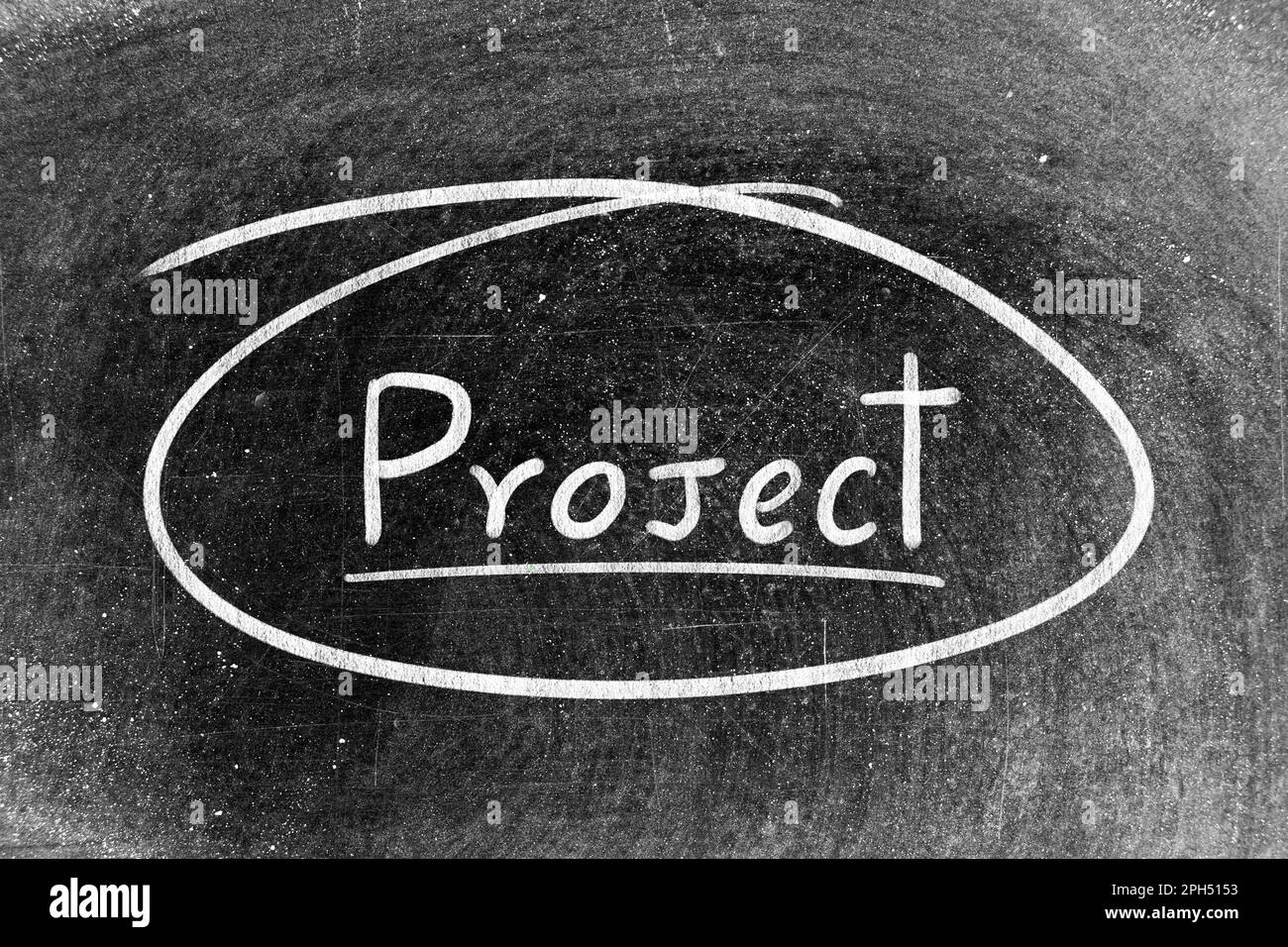 White chalk hand writing in word project and circle shape on blackboard ...