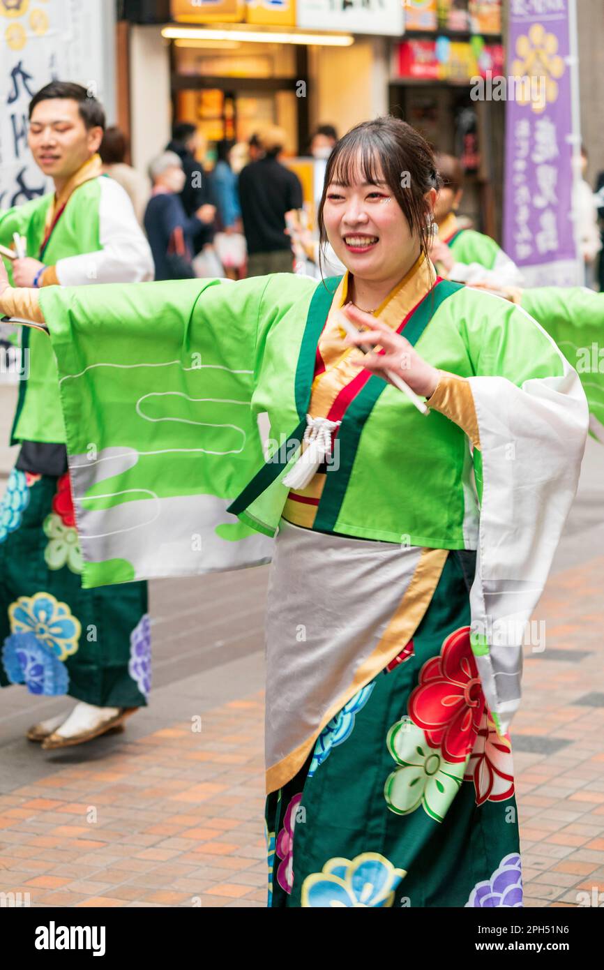 Close up of young adult woman Japanese Yosakoi dancer wearing a ...
