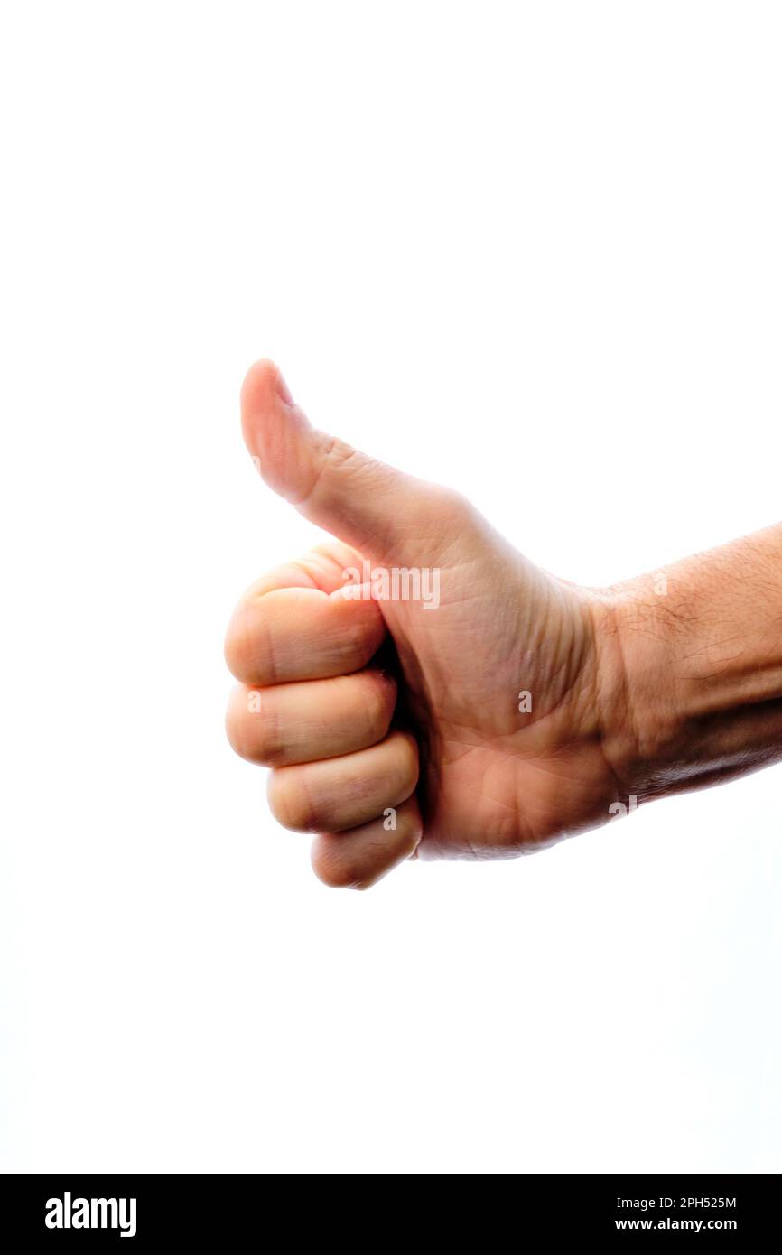 Man's hand with thumbs up giving an ok, ok sign Stock Photo - Alamy